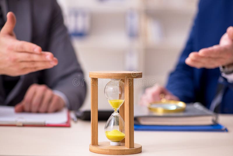 Two Businessmen in Time Management Concept Stock Image - Image of ...