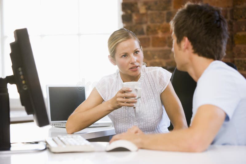 Two Businesspeople in Office Talking Stock Image - Image of adult ...