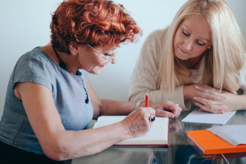 Two Businesswoman Exchanging Ideas Stock Image - Image of exchange ...