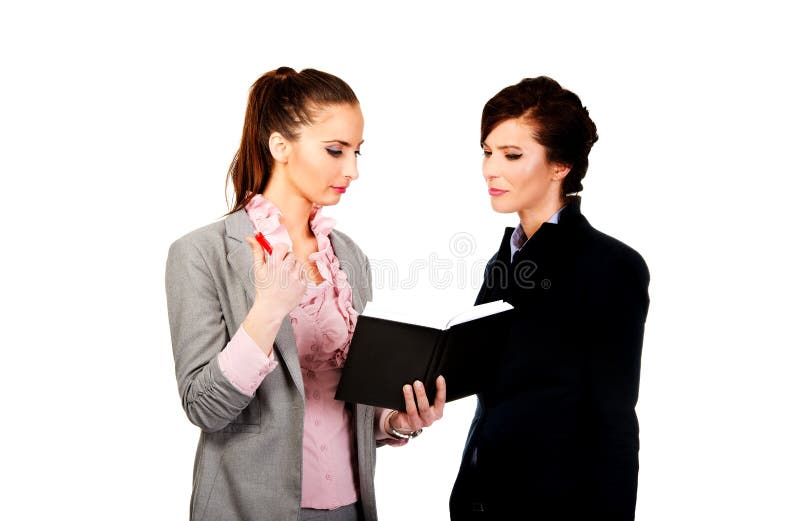 Two Businesswomans Discussing with Eachother. Stock Image - Image of ...