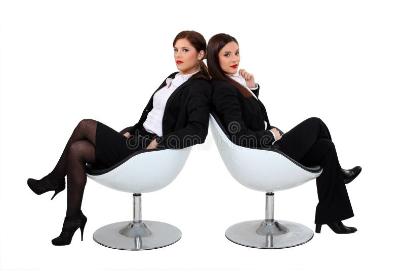Two Businesswomen in Designer Chairs Stock Photo - Image of banner ...