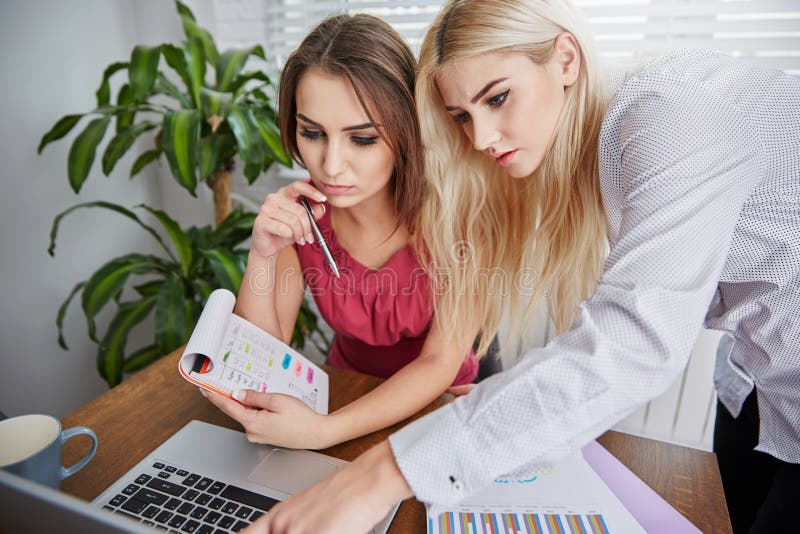 Two Businesswomen Focused on Work at Home Office Stock Image - Image of ...