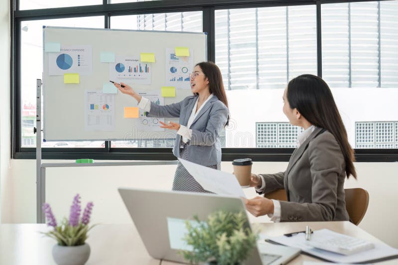 Businesswomen Discussing and Exchanging Ideas in a Modern Office ...