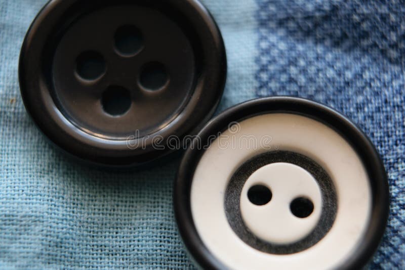 Two buttons closeup stock photo. Image of design, clothing - 92333946
