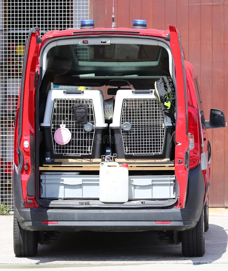 Two Cages for Transporting Animals Inside the Red Van without People ...