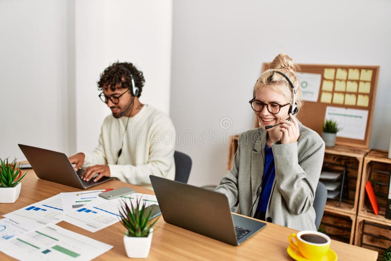 Two Call Center Agents Working at the Office Stock Image - Image of ...