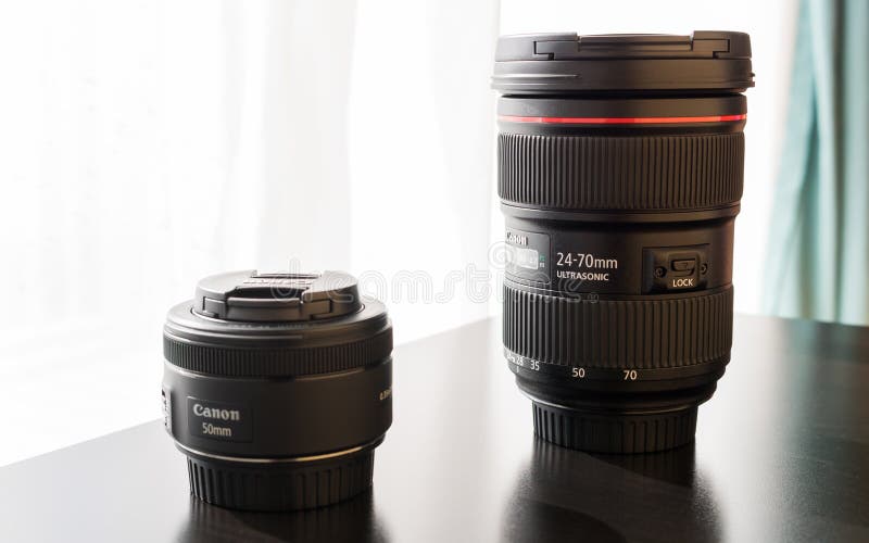 Two Camera Lenses on a Sleek Dark Shiny Table Editorial Stock Image ...