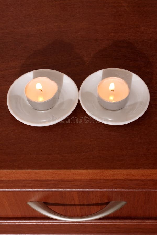 Two candles stock image. Image of interior, smile, face - 14528393
