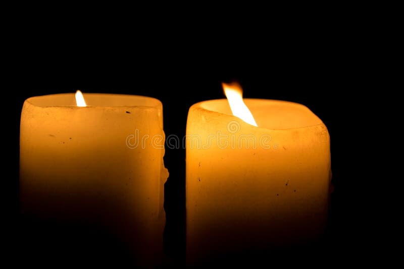 Two Candles Burning stock photo. Image of glow, flame - 83000978