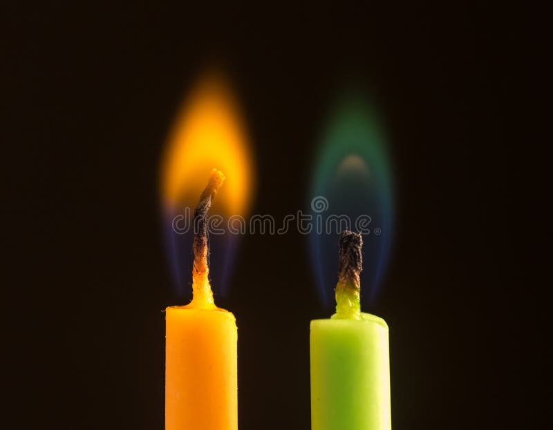 Two candles stock image. Image of fire, yellow, color - 48923963