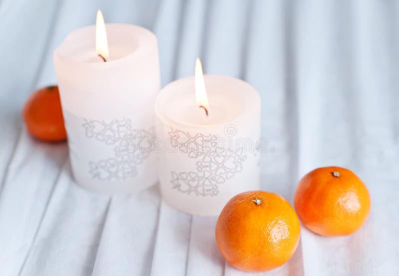 Two candles stock photo. Image of tangerines, season - 36020464