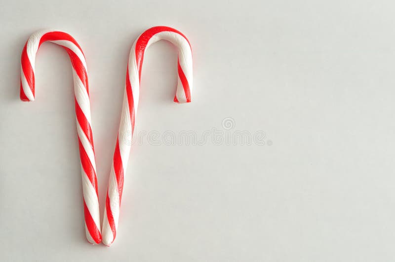 Two Candy Canes Isolated Stock Photos - Download 213 Royalty Free Photos