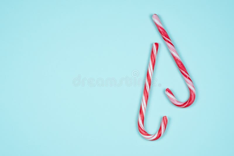 Two Candy Canes on a Light Blue Background Stock Photo - Image of ...