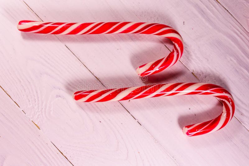 Two Candy Canes on a Wooden Table. Top View Stock Image - Image of cane ...