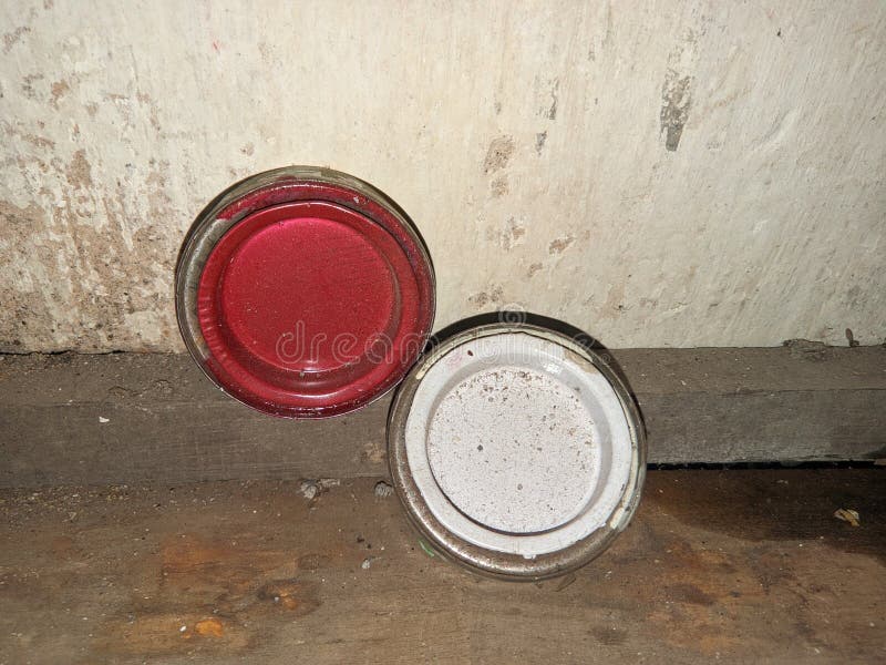 Two Cans of Paint, Lids are Red and White Stock Image - Image of cans ...