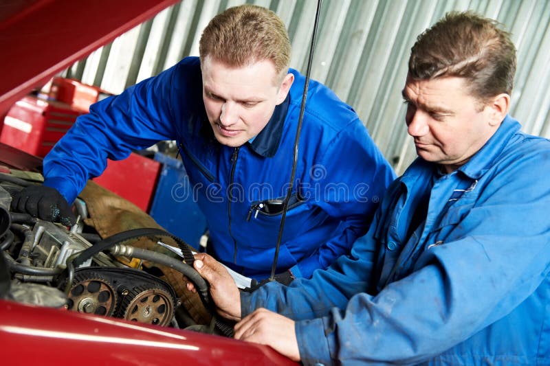 Two Car Mechanic Diagnosing Auto Engine Problem Stock Photo - Image of ...