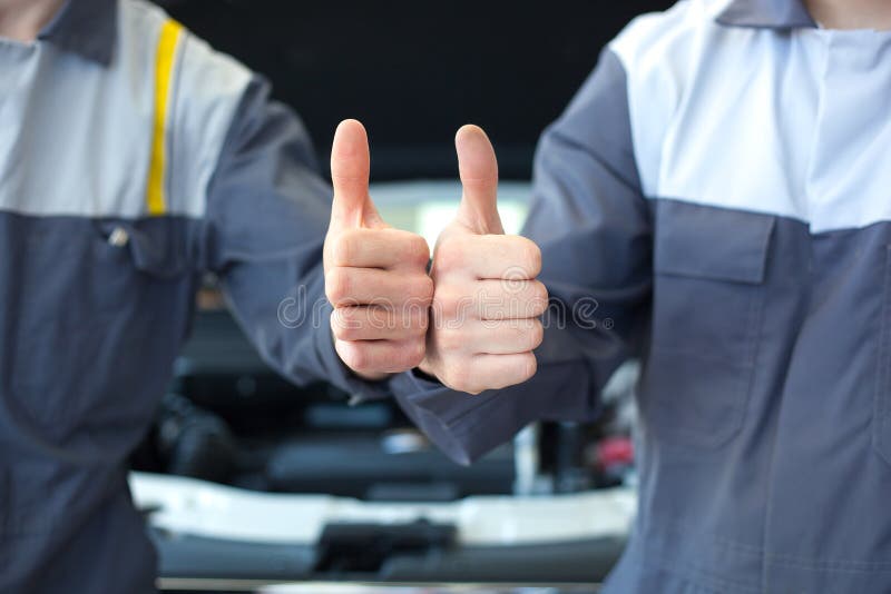 Two car mechanic hands stock photo. Image of caucasian - 48422430