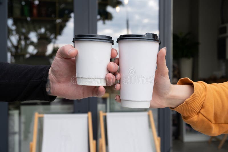 Two Cardboard Cups Mock Up in Hands. Template for Logo on Drinks To Go ...