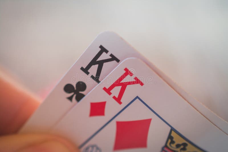 Two Cards Two Kings, Playing Cards in Hand on the Table, Poker Nands ...