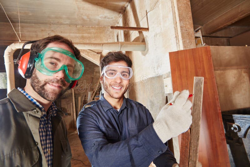 Two Carpenters Cooperating with Each Other Stock Image - Image of ...