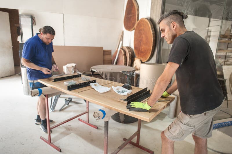 Two Carpenters Making Furniture in a Workshop Stock Photo - Image of ...