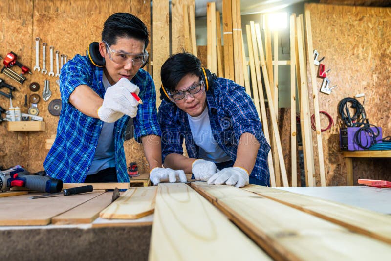 Two Carpenters are Working in a Wood Factory Stock Image - Image of ...