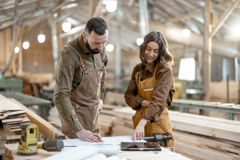 Two Carpentry Workers at the Manufacturing Stock Photo - Image of ...
