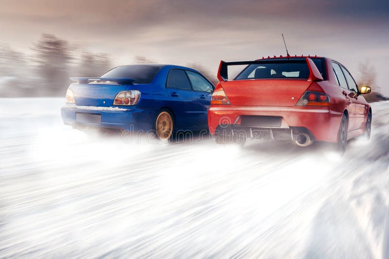 Two Cars Compete in Race at Winter Sunset Stock Photo - Image of ride ...