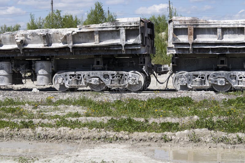 Two Cars of a Freight Train Operating on a Chalk Mining Stock Photo ...