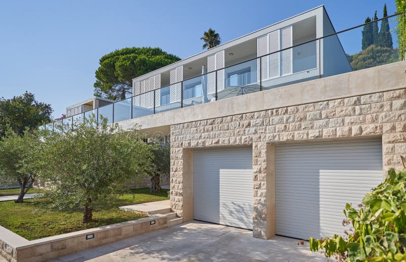 Two Cars Garage in a Modern House Stock Image - Image of modern ...