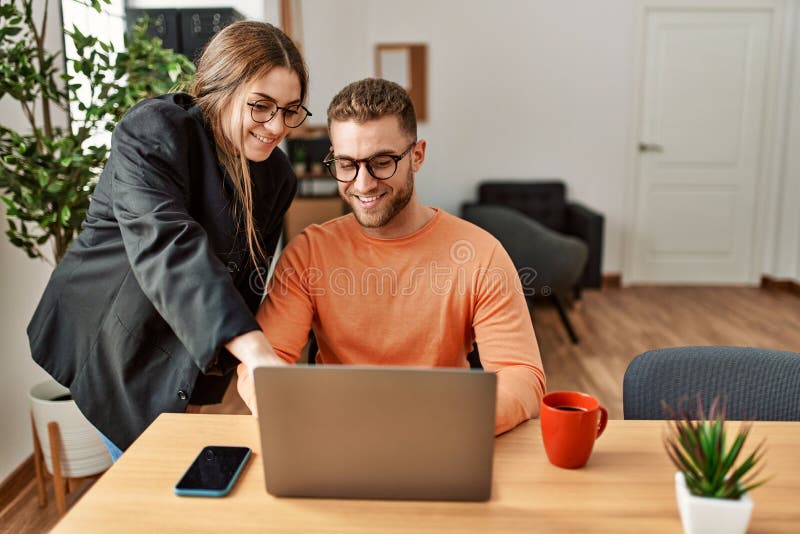 Two Caucasian Business Executives Working and Drinking Coffee at the ...