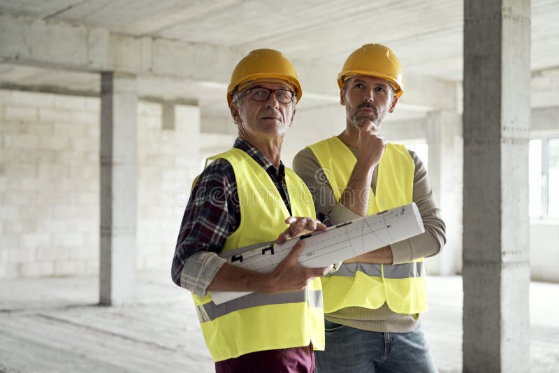 Man Working on Construction Site Stock Photo - Image of built, laptop ...