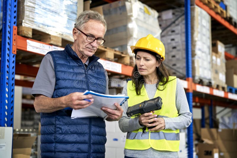 Working in warehouse stock photo. Image of industry - 250004584