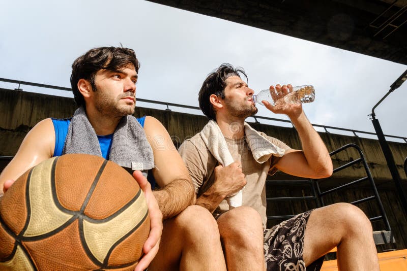 Two Causian Basketball Player Resting and Ralax Stock Photo - Image of ...