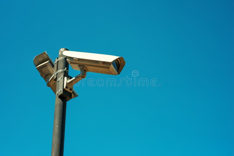 Two CCTV Security Cameras Mounted on High Post Stock Image - Image of ...