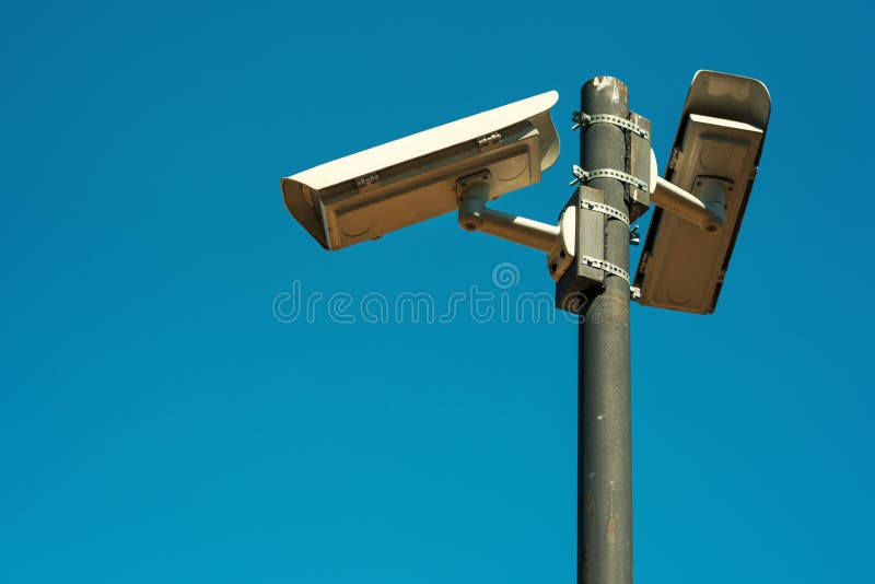 Two CCTV Security Cameras Mounted on High Post Stock Image - Image of ...