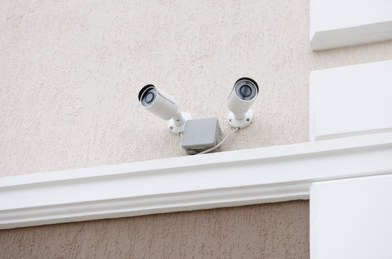 Two CCTV Security Cameras on the Wall of the Facade Stock Image - Image ...