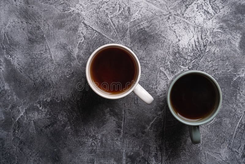 Two Ceramic Cups with Black Tea, Hot Drink in White and Grey Cup on ...