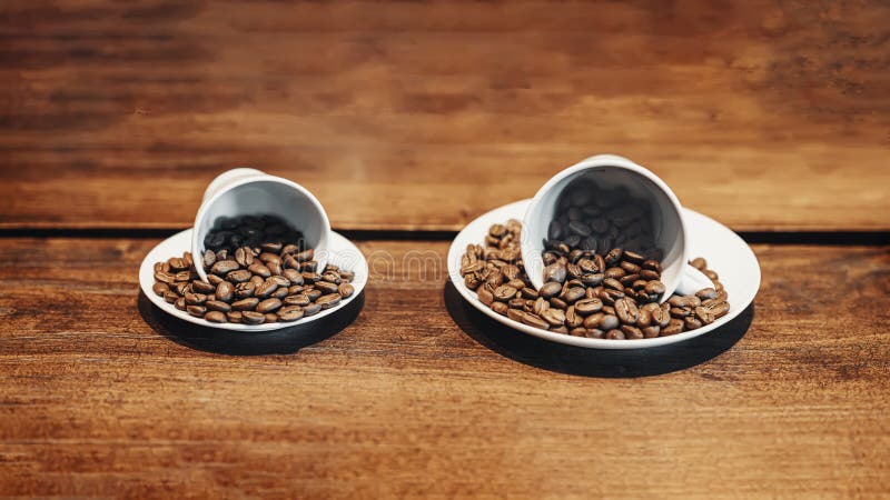 Two Ceramic Cups Spill Roasted Coffee Beans on Wooden Surface ...