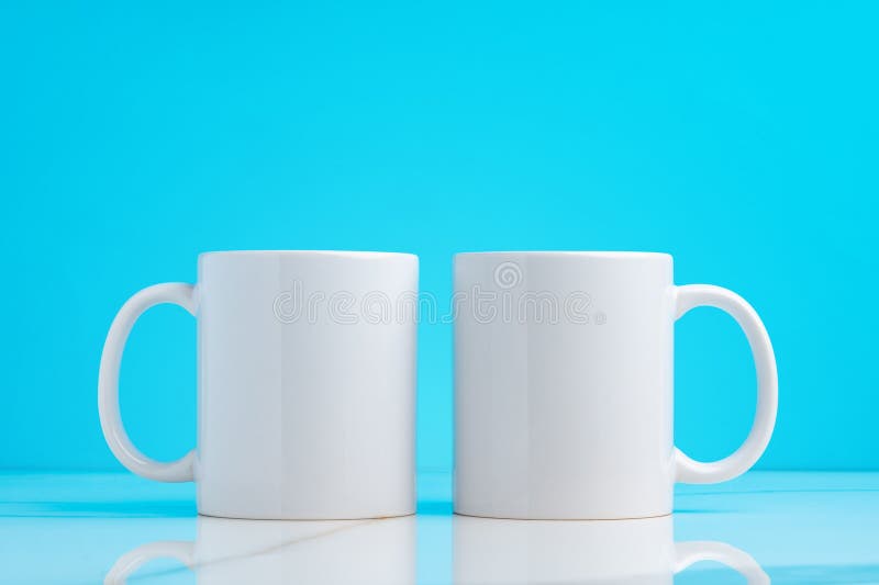 Two Ceramic Mugs on Blue Studio Background Stock Image - Image of ...