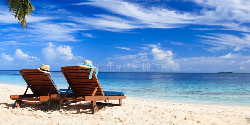 Two Beach Chairs on the White Sand with Blue Sky and Summer Sea Stock ...
