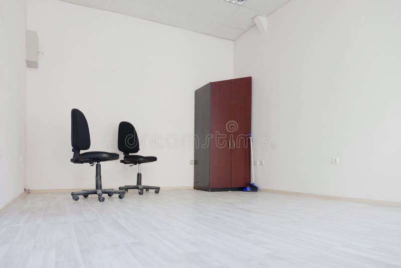 Two chairs and a wardrobe stock photo. Image of iron - 28052526