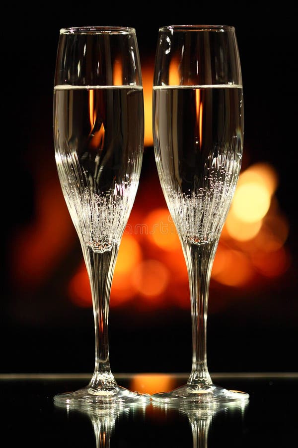 Two champagne glasses stock image. Image of fireplace - 9518147