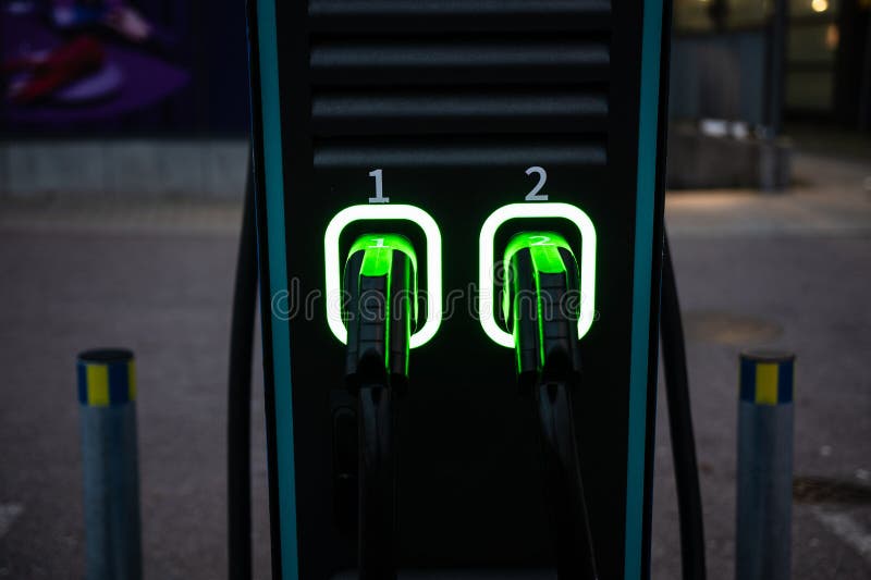 Two Charging Handles of an Electric Car Charger.. Stock Image - Image ...