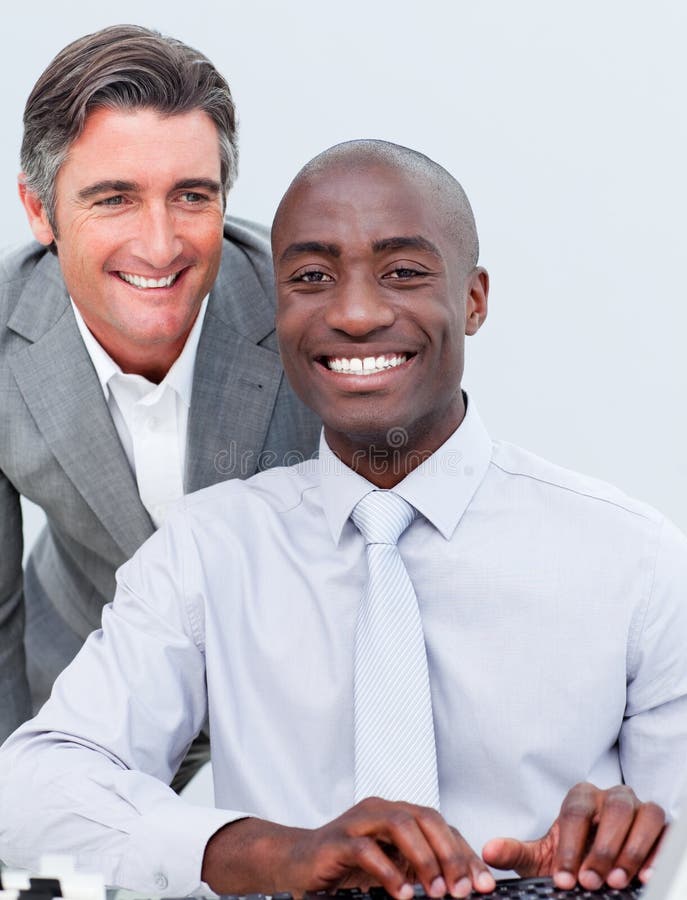 Two Charming Businessman Working at a Computer Stock Photo - Image of ...