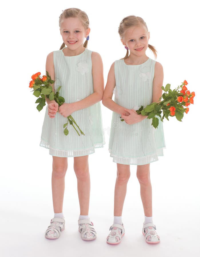 Two Charming Girls with Bouquets of Roses. Stock Image - Image of ...