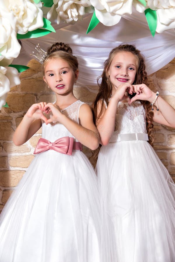 Two Charming Princesses at a Birthday Celebration Stock Photo - Image ...