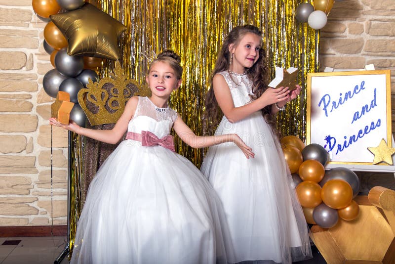 Two Charming Princesses at a Birthday Celebration Stock Photo - Image ...