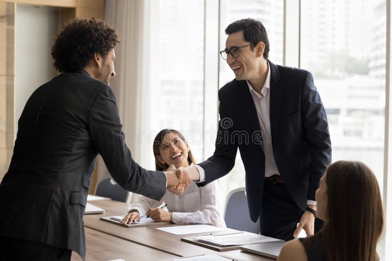 Two Cheerful Arab Project Managers Men Shaking Hands Stock Image ...