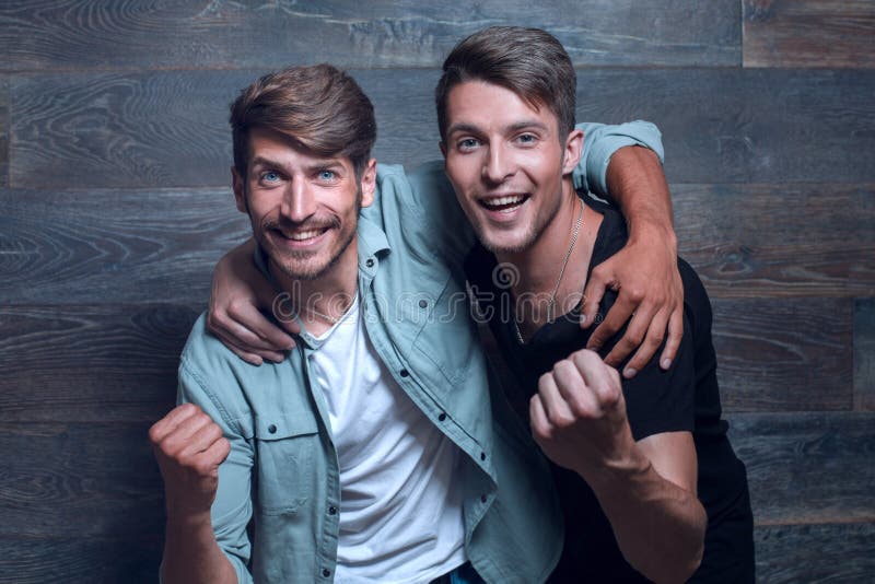 Two cheerful guys stock image. Image of friend, camera - 144339335